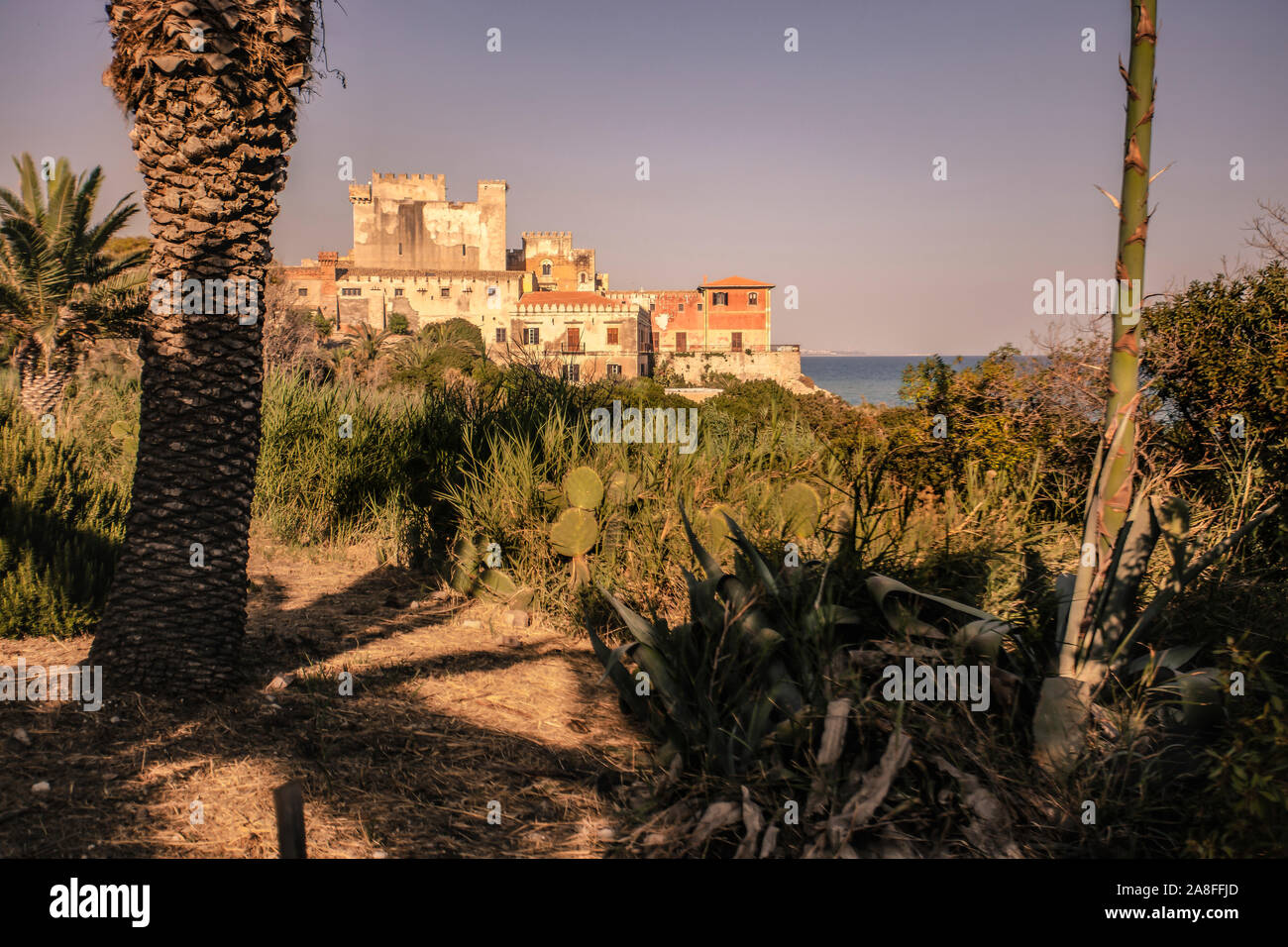 Side view from the beach of the castle of Falconara Stock Photo - Alamy
