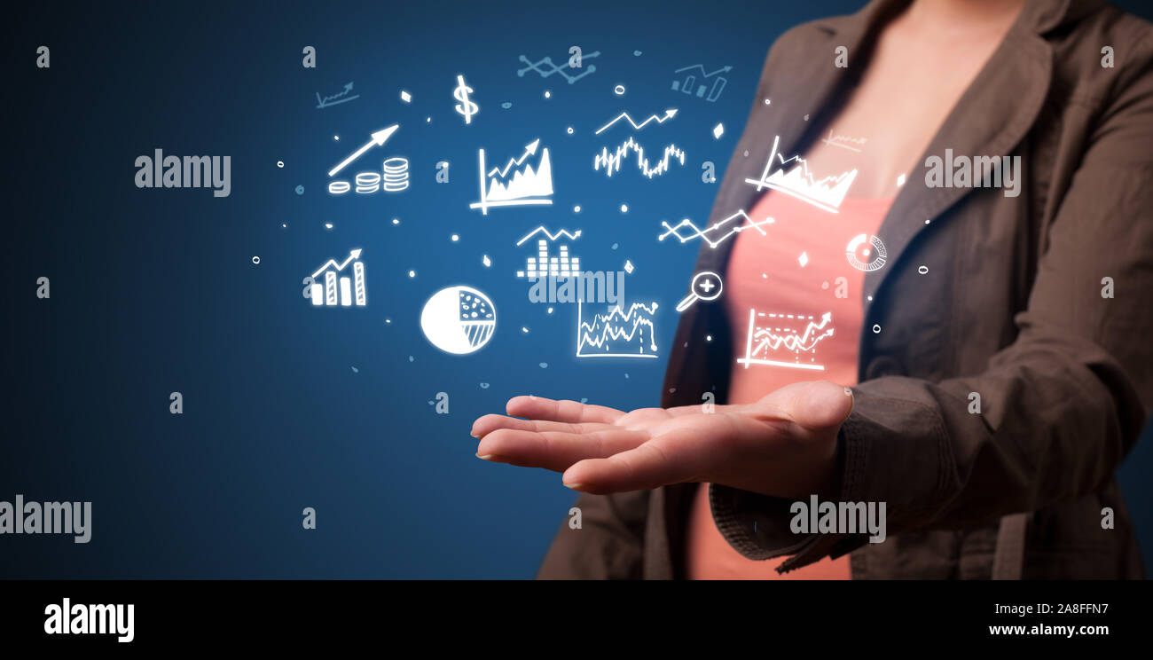 Hand holding application icons and symbols in her hand Stock Photo - Alamy