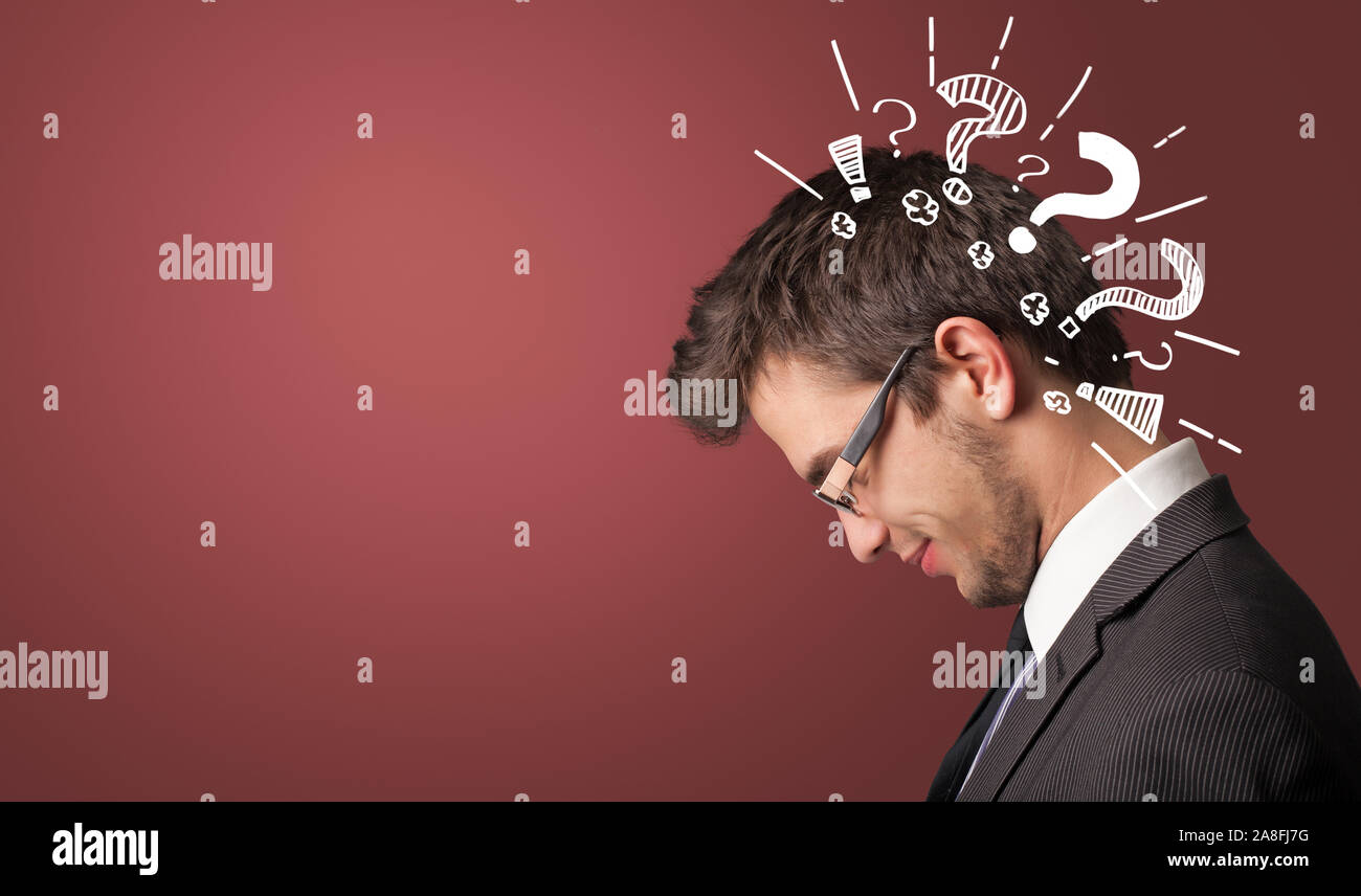 Head with white question marks, and copy space Stock Photo - Alamy