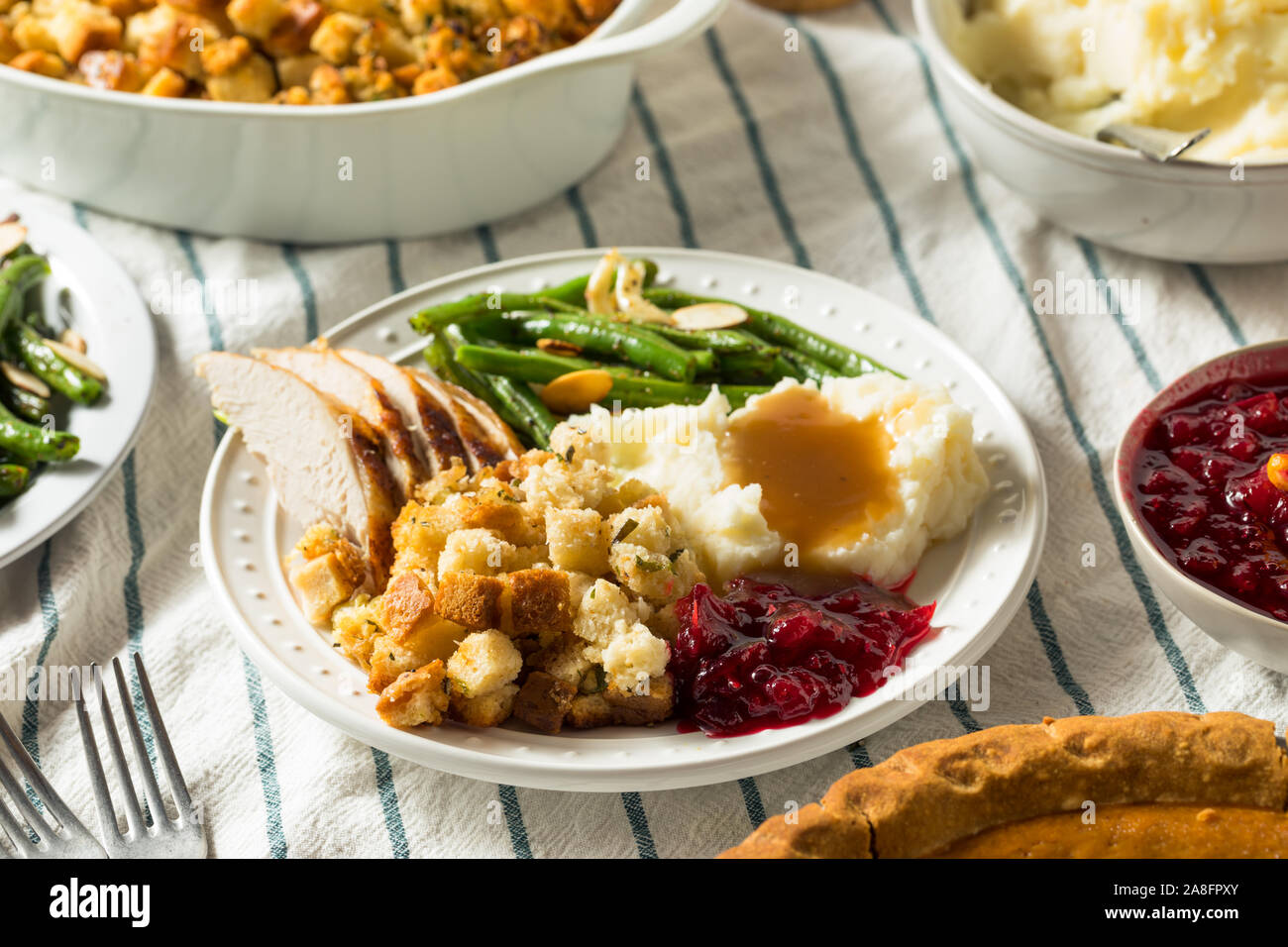 Homemade Thanksgiving Turkey Dinner with Stuffing Potatoes and Green ...
