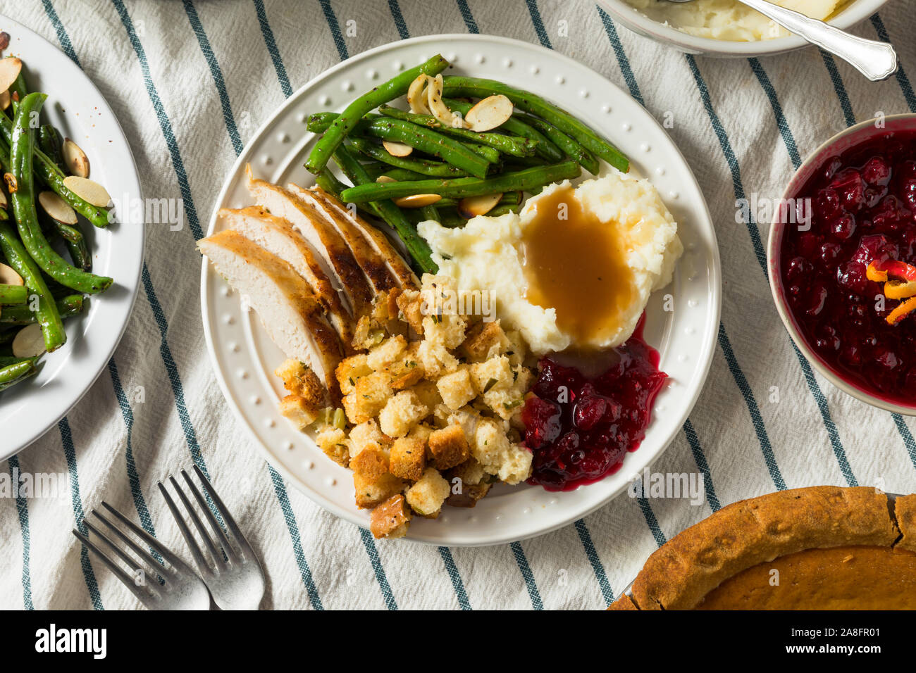 Homemade Thanksgiving Turkey Dinner with Stuffing Potatoes and Green ...