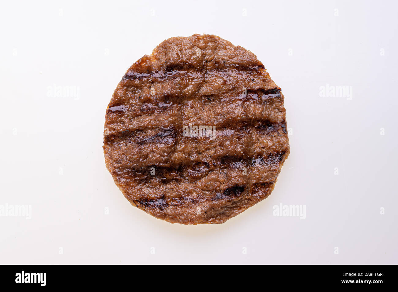 Vegan patty isolated on white background Stock Photo - Alamy