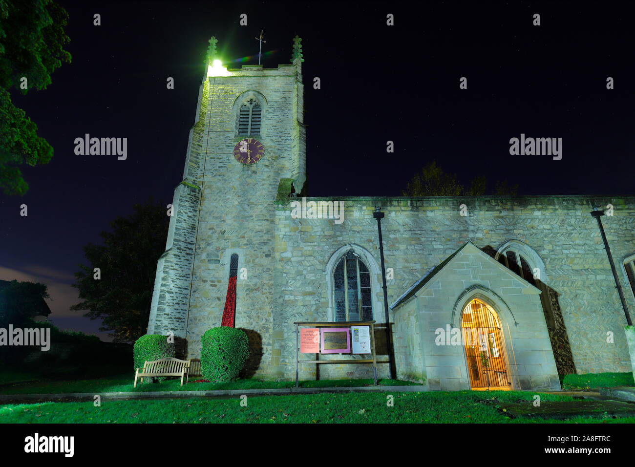 St Mary's Church of England in Kippax which has poppies cascading from ...