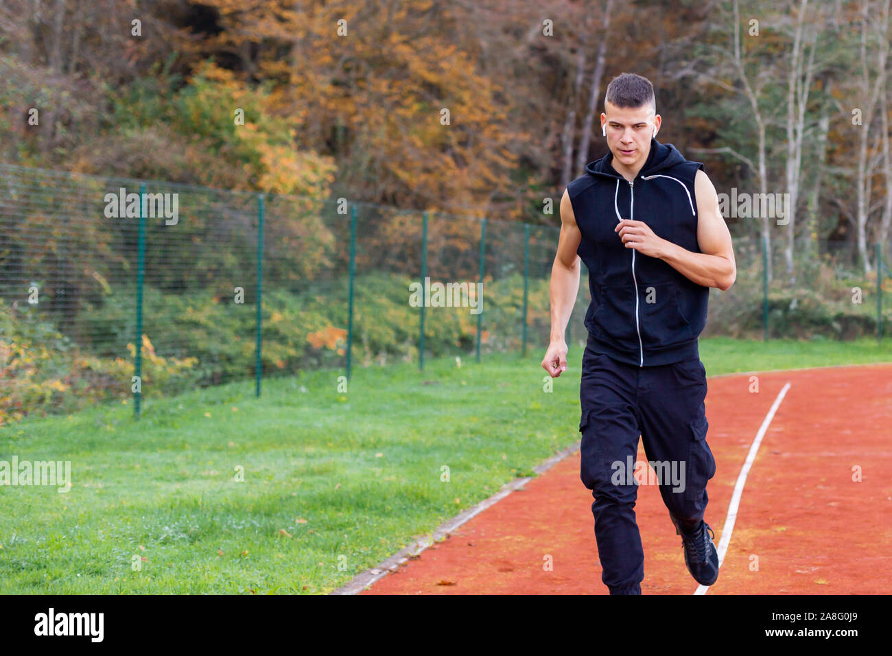 Young muscular man jogging hi-res stock photography and images - Alamy