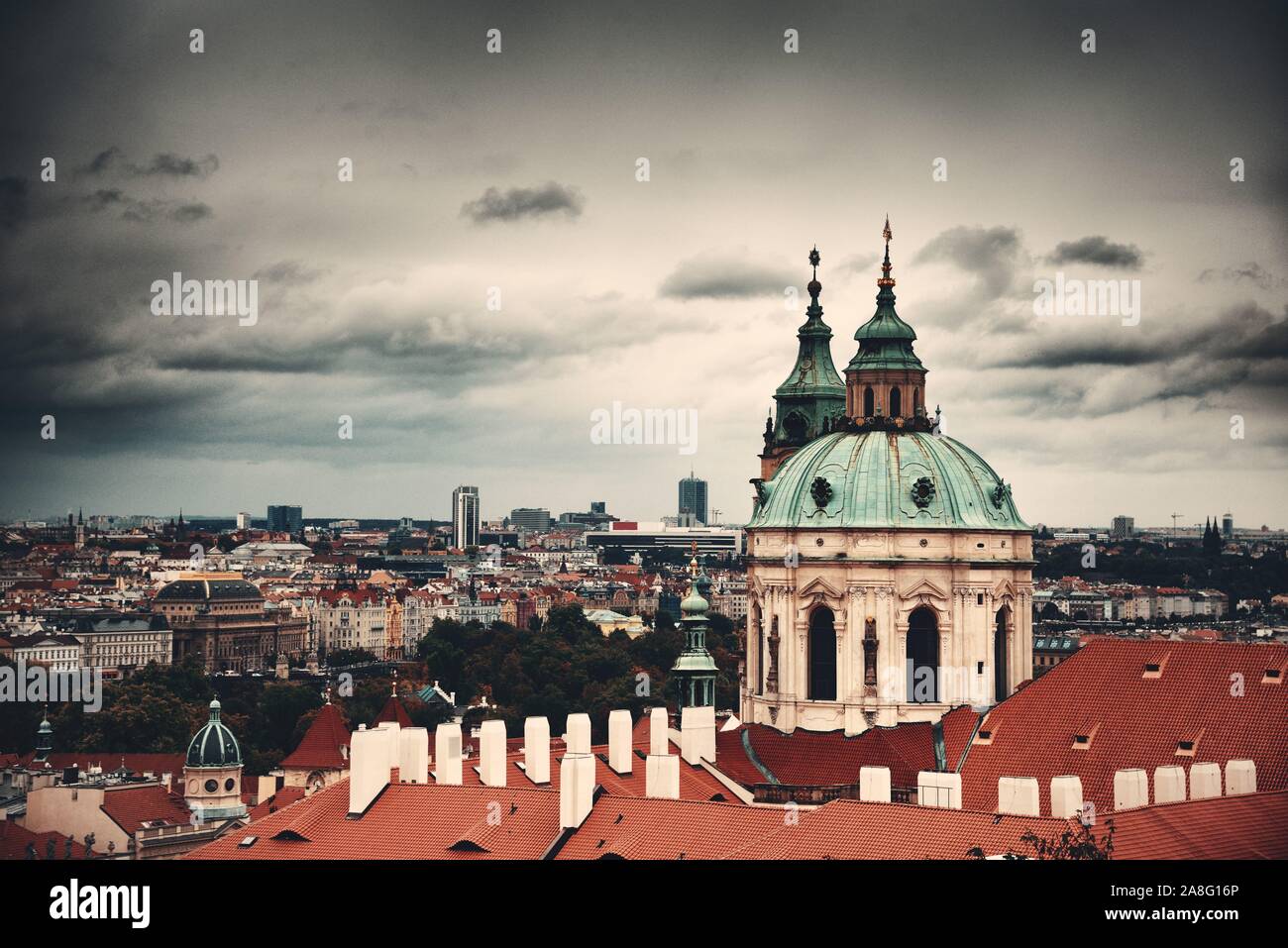 Prague skyline rooftop view with church and dome in Czech Republic ...