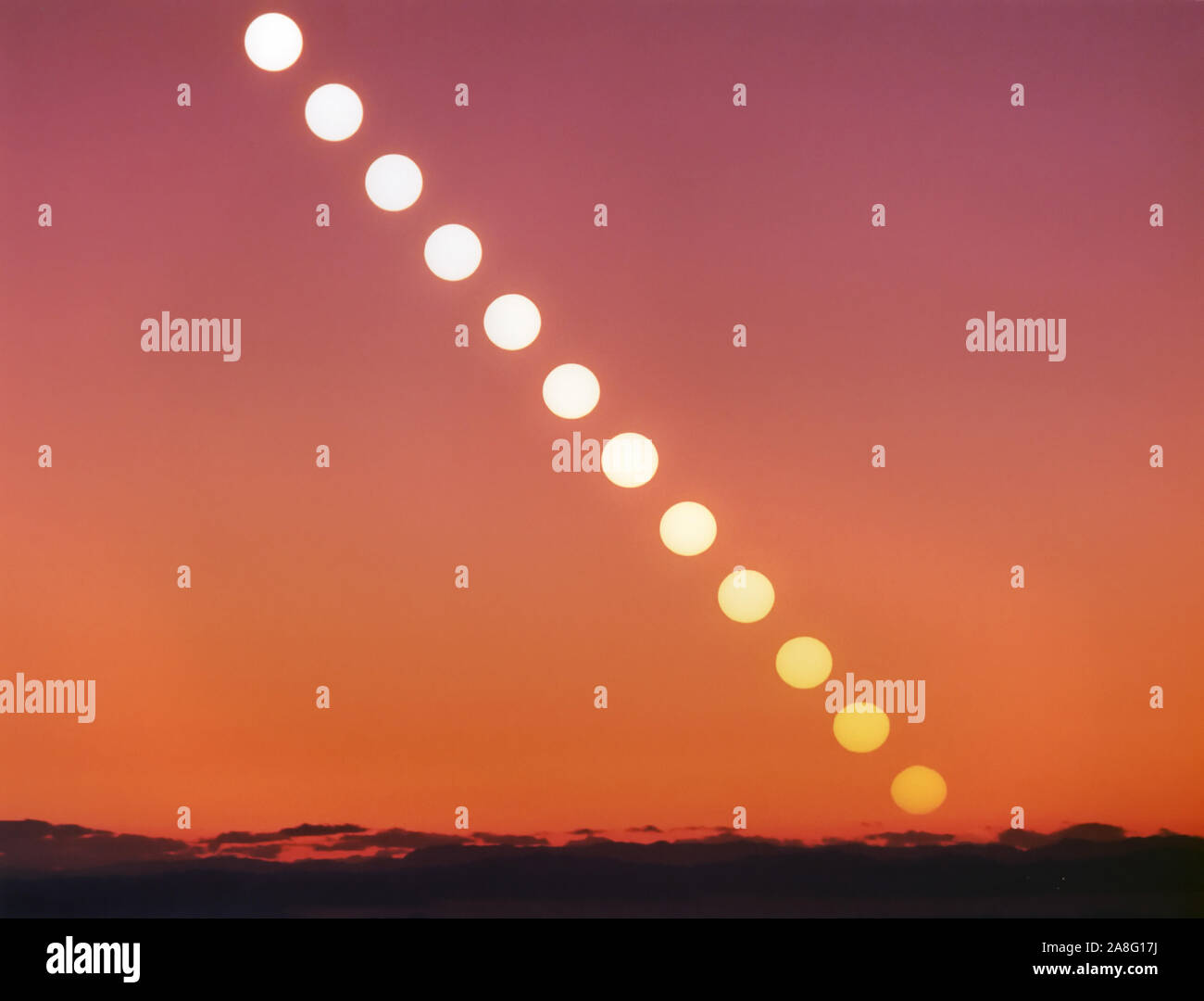 Multiple exposure photograph of the rising sun Stock Photo - Alamy