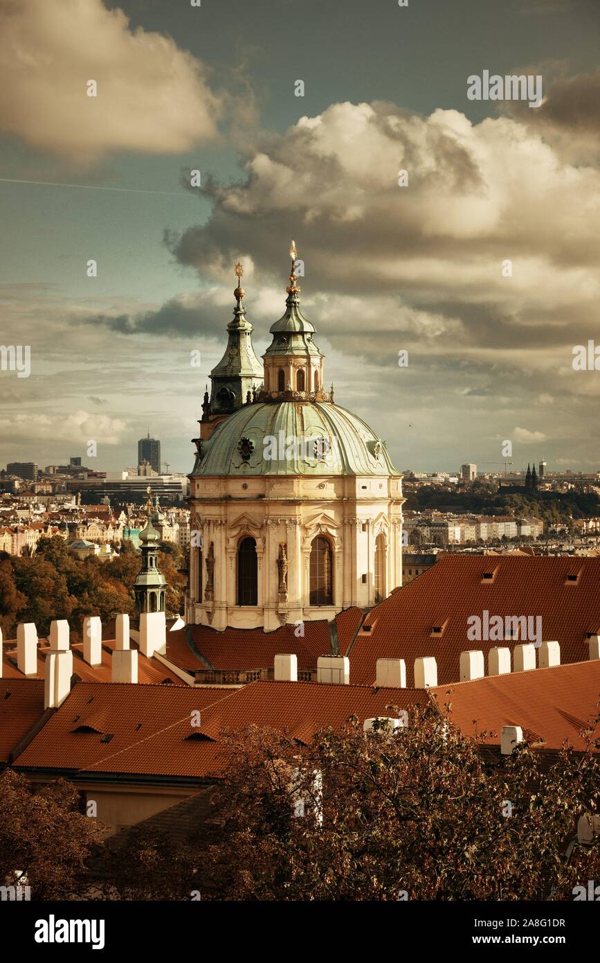 Prague skyline rooftop view with church and dome in Czech Republic ...
