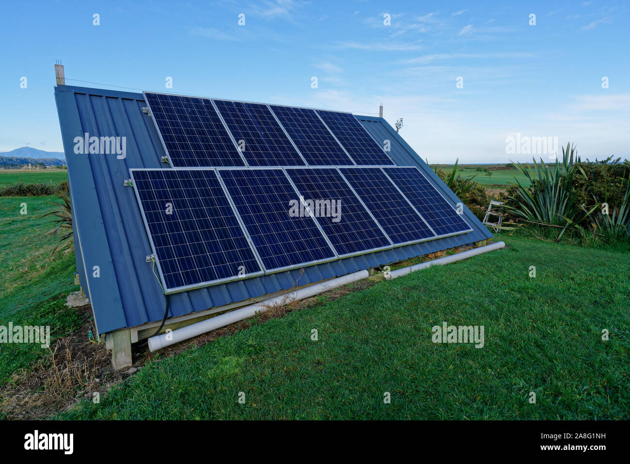 Living off the grid. Solar panels providing electricity to an off grid ...
