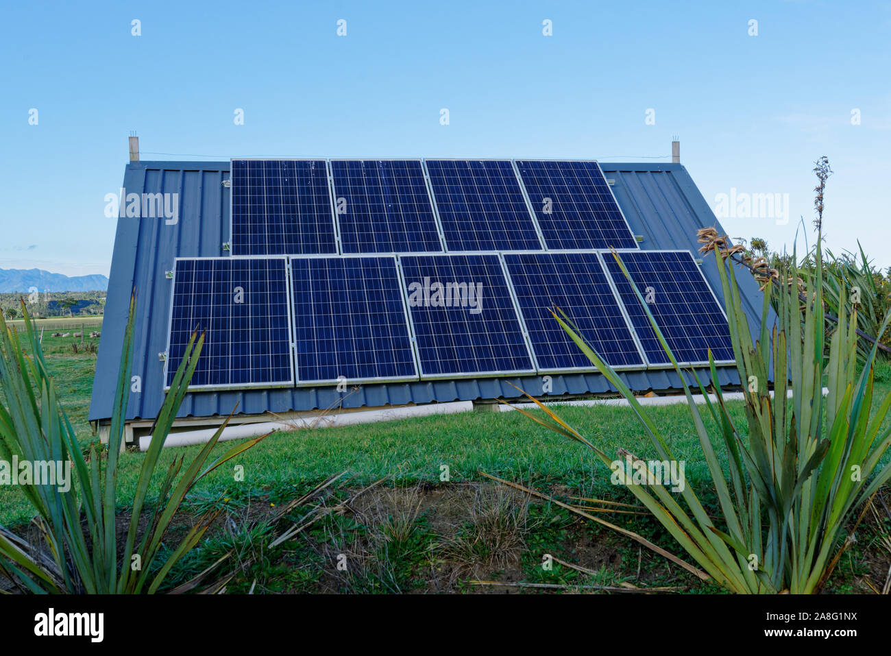 Living off the grid. Solar panels providing electricity to an off grid ...