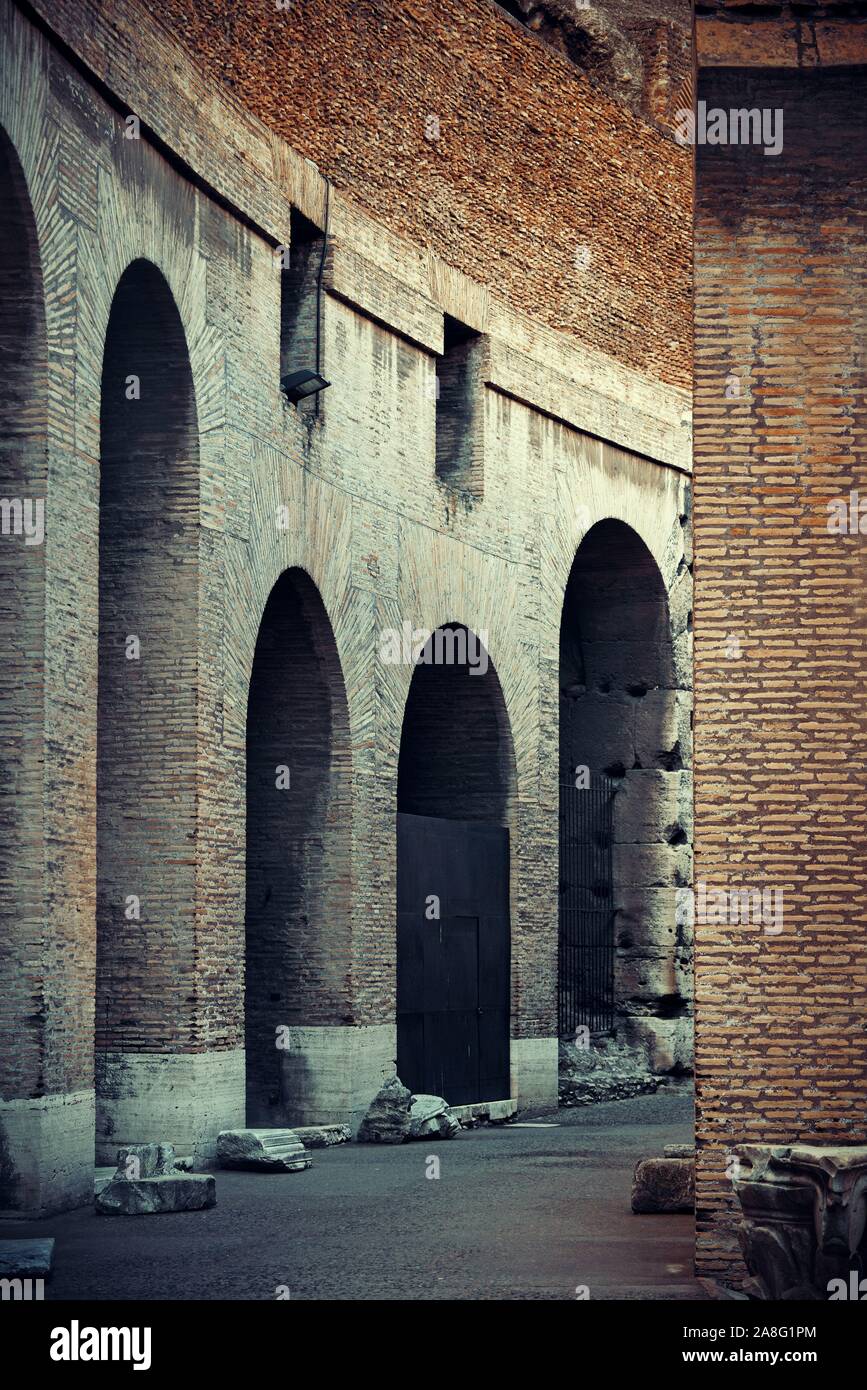 Archway in Colosseum, the world known landmark and the symbol of Rome ...