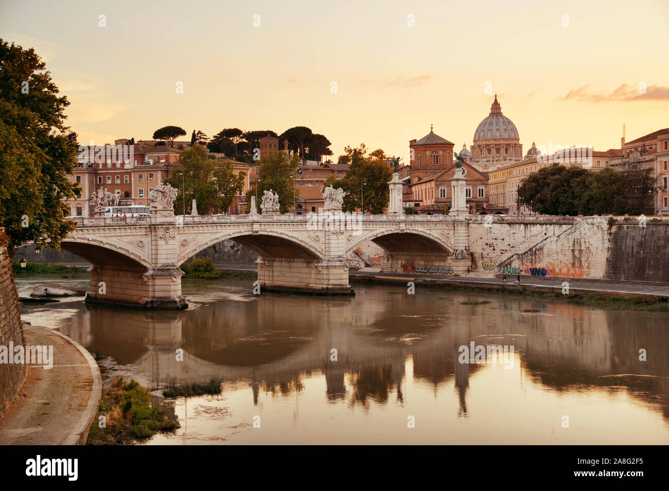 River Tiber and St Peters Basilica in Vatican City at sunset Stock ...