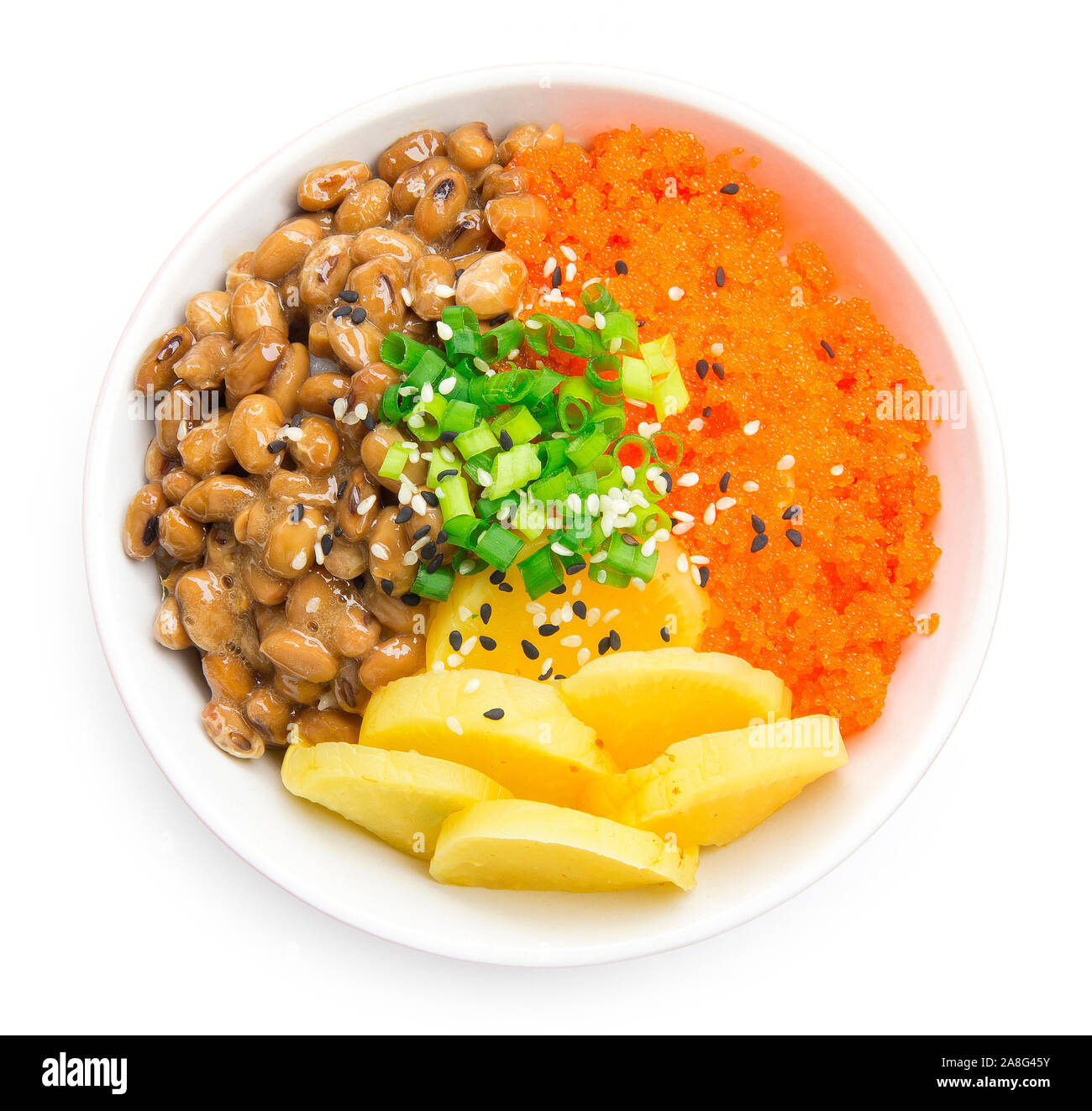 Rice don with natto, tobiko egg and pickled radish in soy sauce japan ...