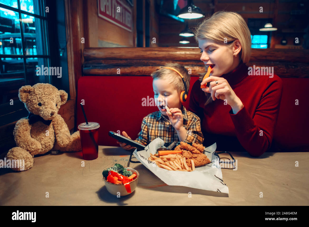 Children headphones dinner hi-res stock photography and images - Alamy