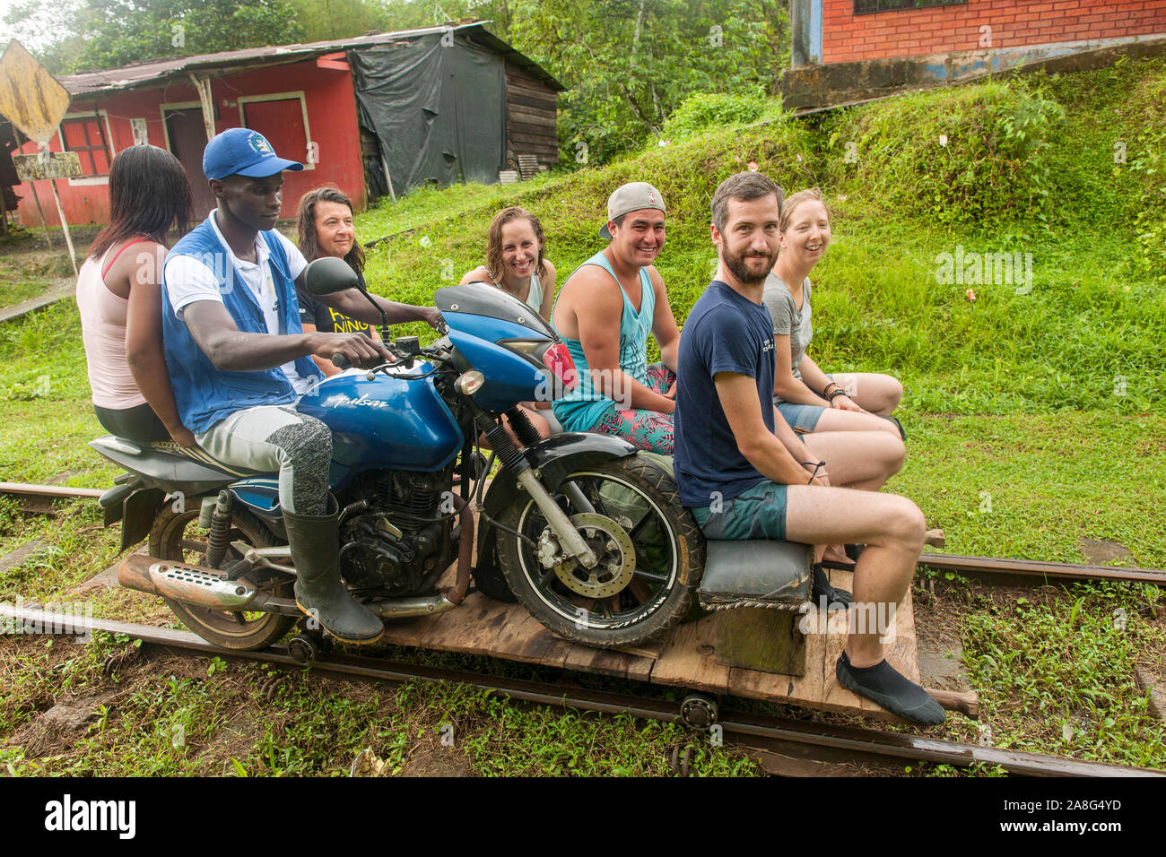 Riding a motorcycle brujita on disused railway tracks to the village of ...