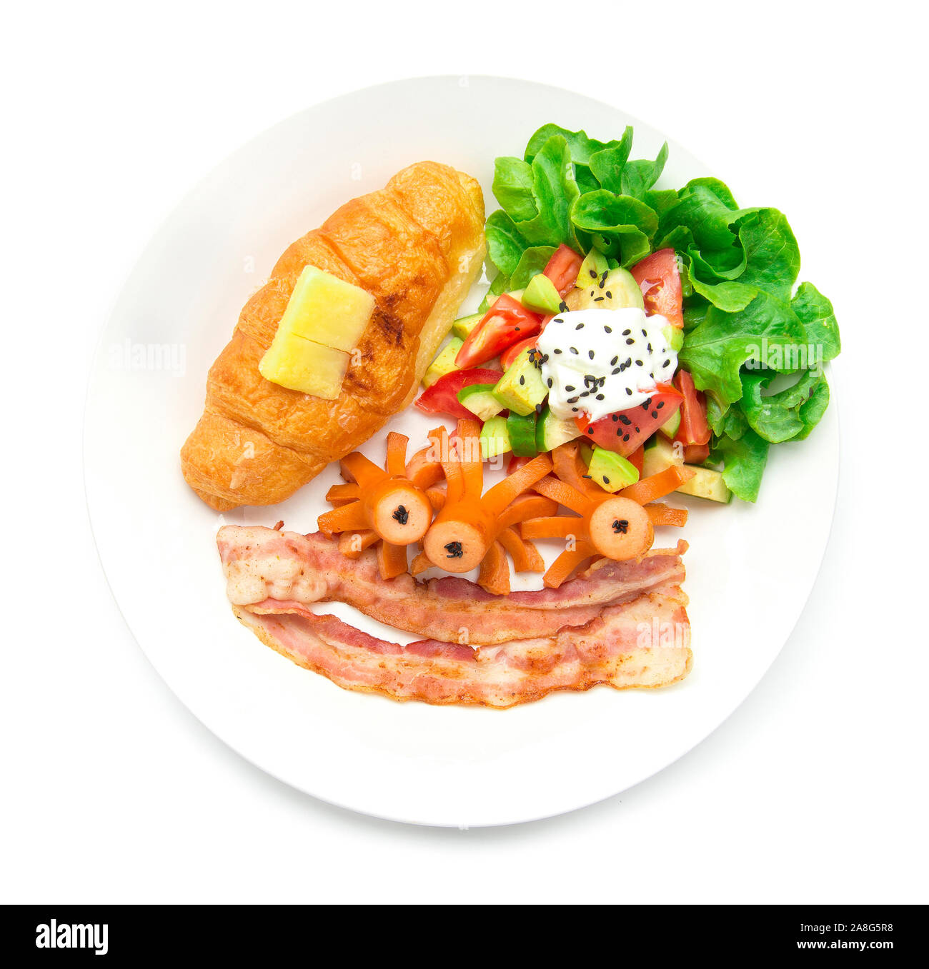 Breakfast set with croissant and sausage pork, Bacon and avocado salad ...