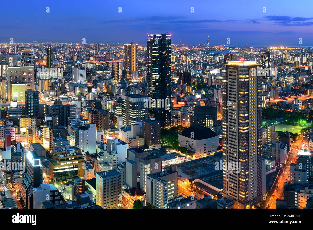 Osaka urban city at night rooftop view. Japan Stock Photo - Alamy