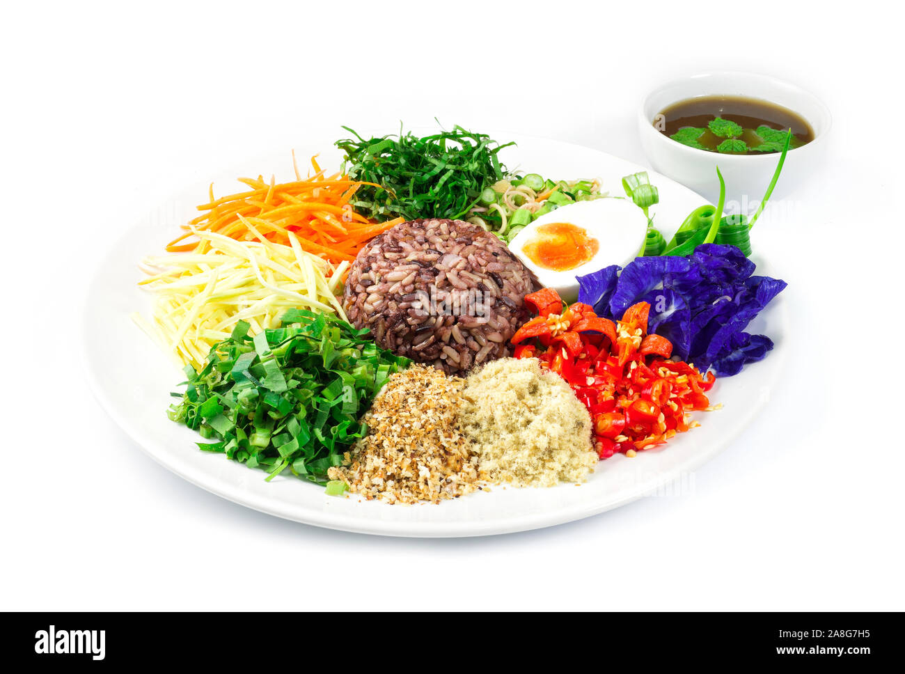 Rice Salad with vegetables and budu fish sauce (Khao Yum) Thai Southern ...