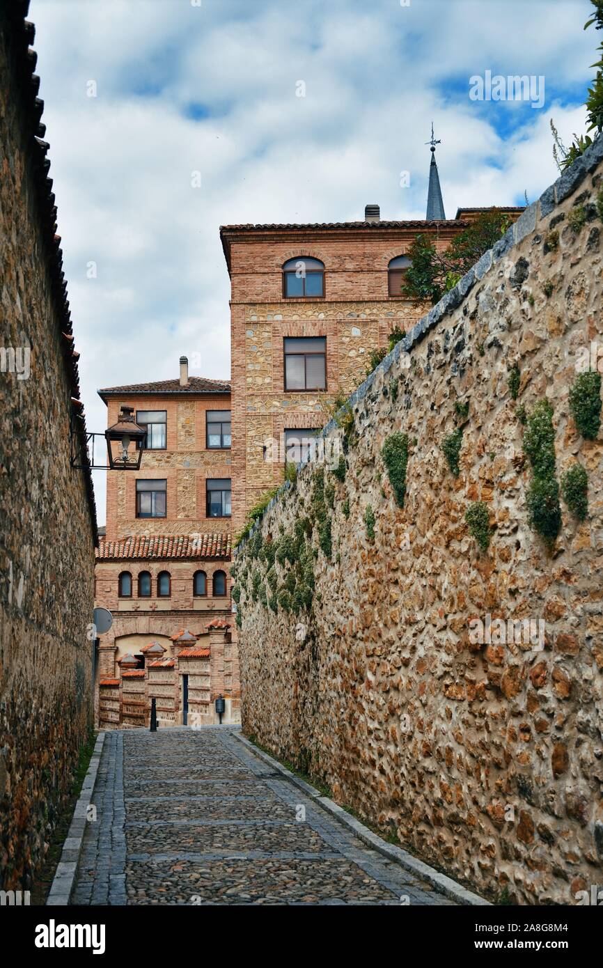 Segovia alley with old buildings street view in Spain Stock Photo - Alamy