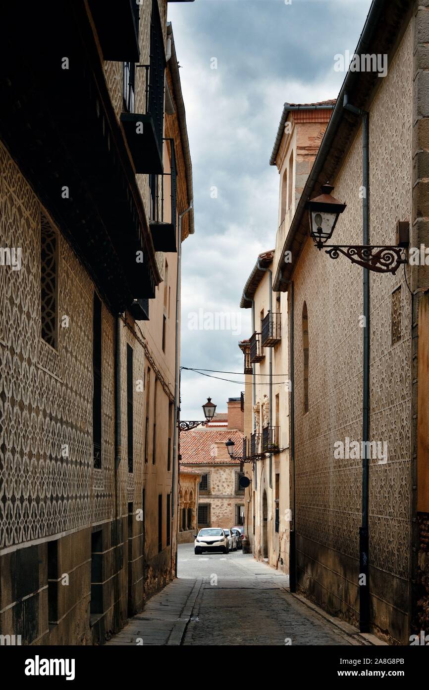 Segovia alley with old buildings street view in Spain Stock Photo - Alamy