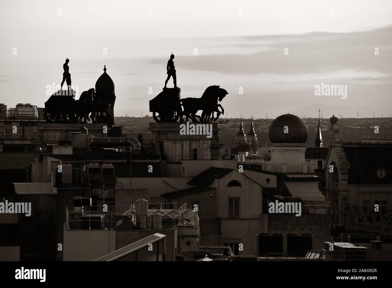 Madrid rooftop view of the city skyline and warrior statue in Spain ...