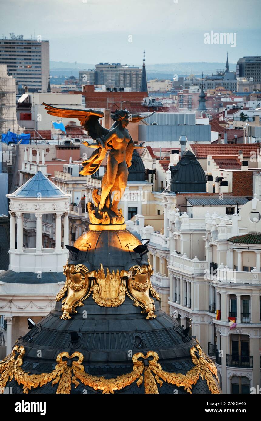 Madrid skyline rooftop view with angel statue and buildings in Spain ...