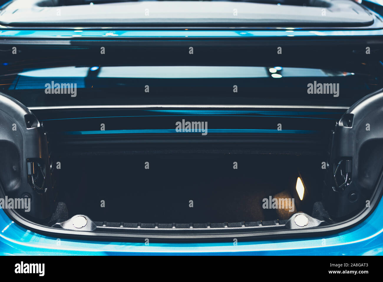 Opened empty blue car trunk Stock Photo - Alamy