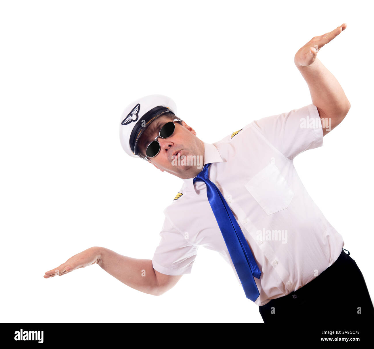 Happy laughing pilot in uniform gesturing flight isolated on white ...