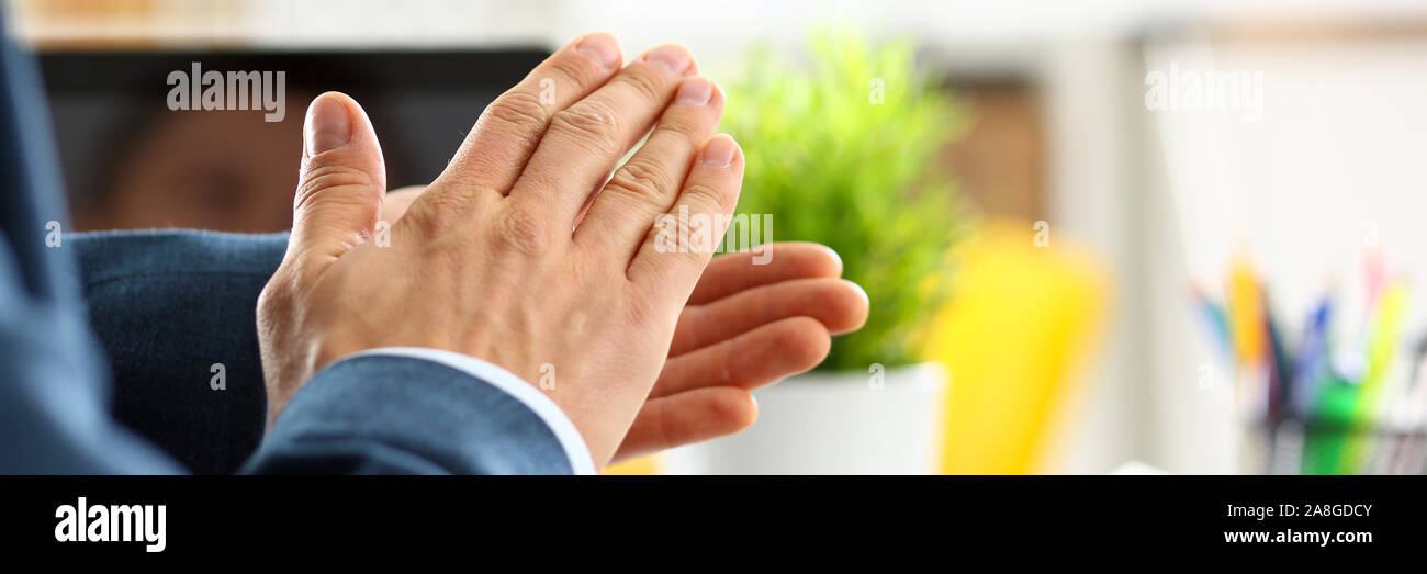 Man in suit clap his arms congrats Stock Photo - Alamy