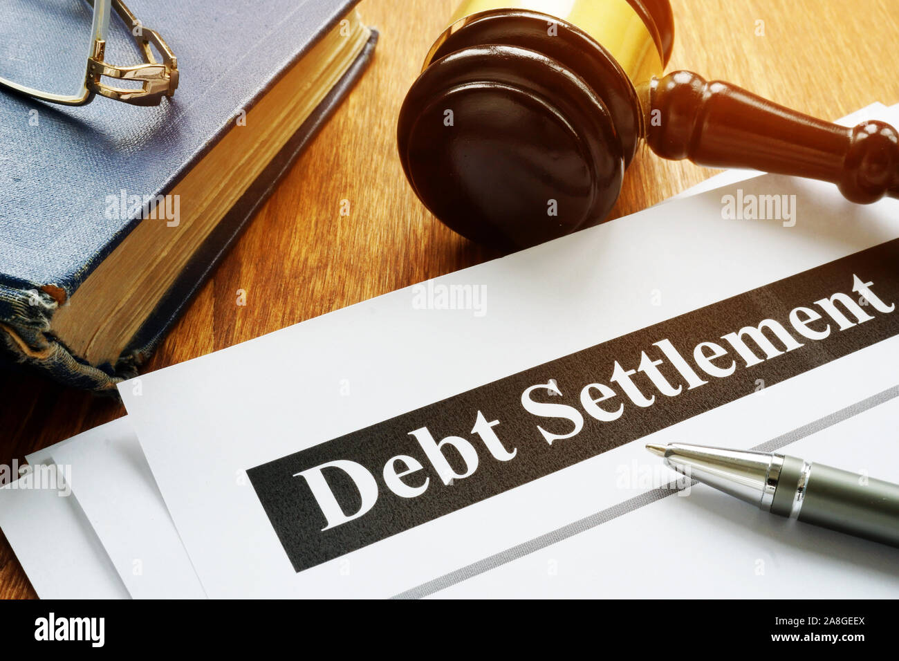 Debt Settlement documents and gavel in the court Stock Photo - Alamy
