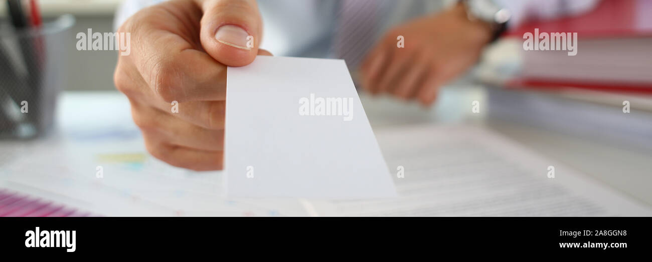 Male arm in suit give blank calling card Stock Photo - Alamy