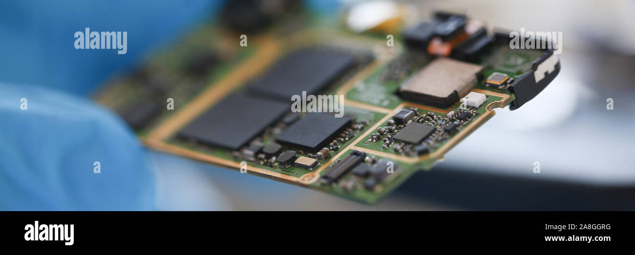 An employee of computer repair service Stock Photo - Alamy