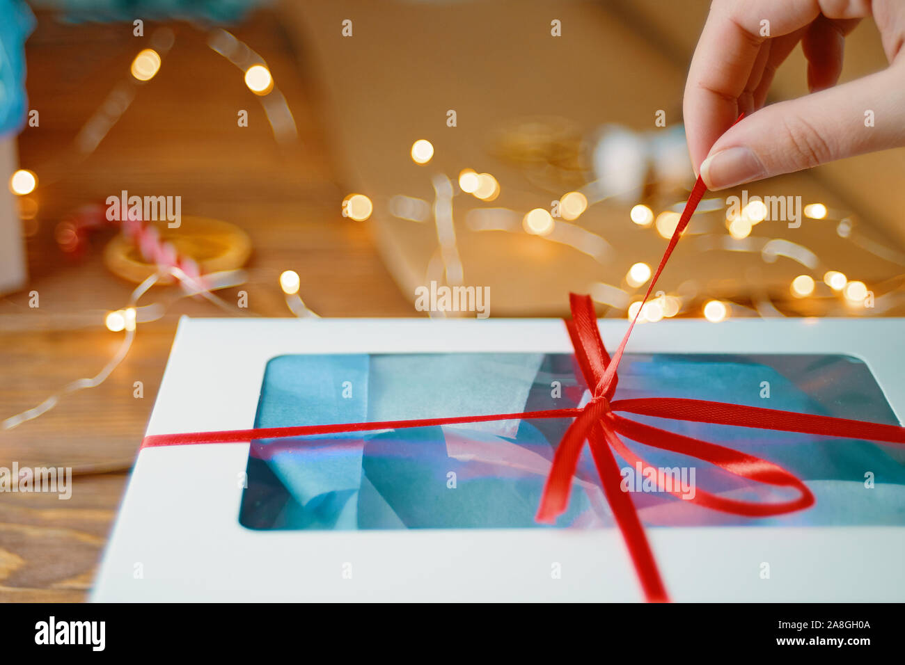 Christmas composition with present box. Festive gift box inside with ...