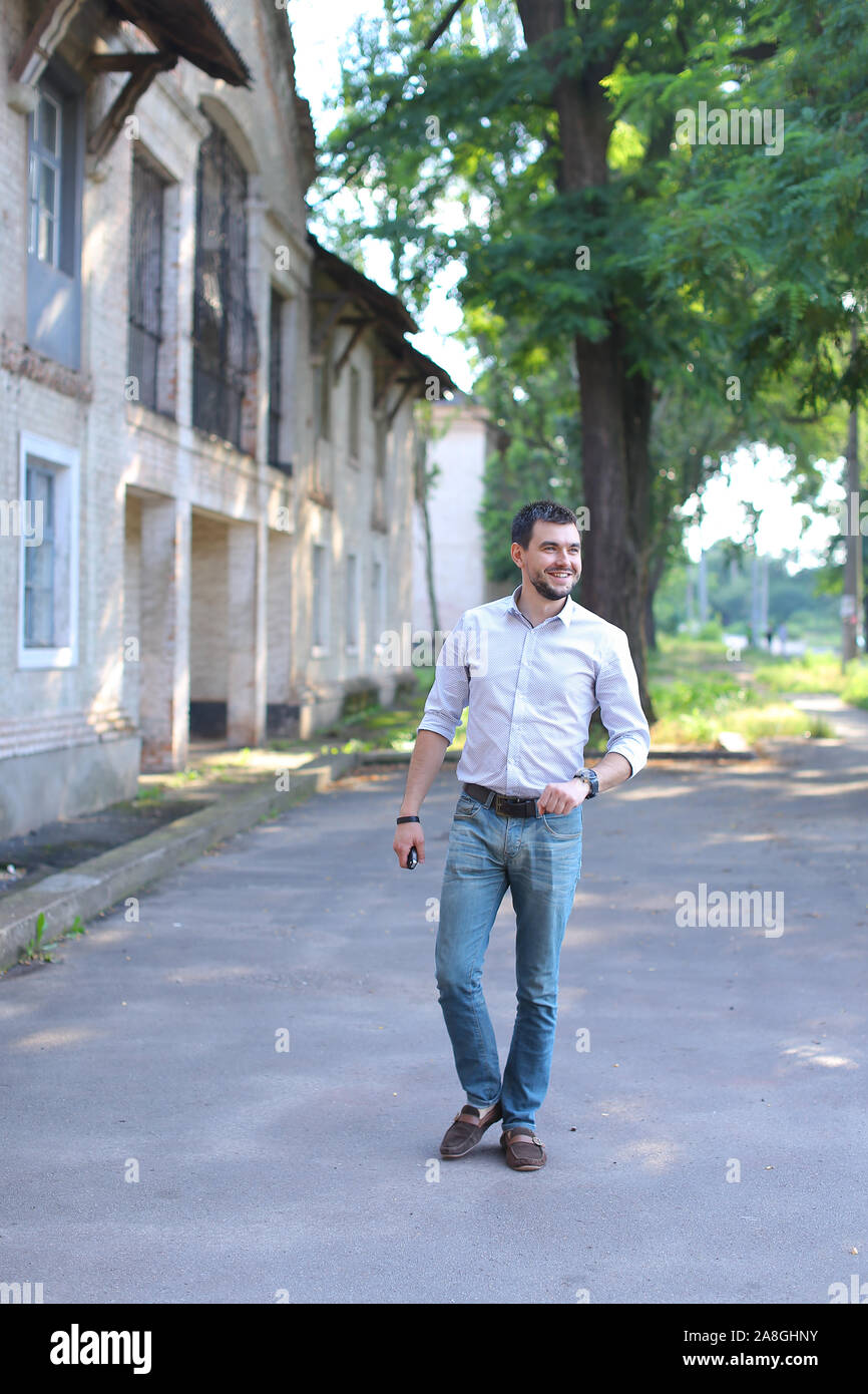 Handsome male man guy smiling and standing still on street road Stock ...