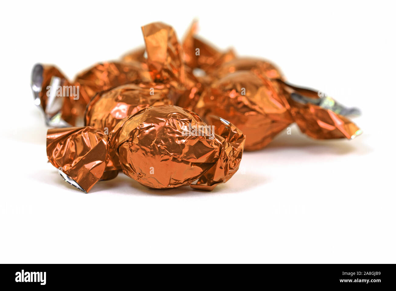 Wrapped sweets white background hi-res stock photography and images - Alamy