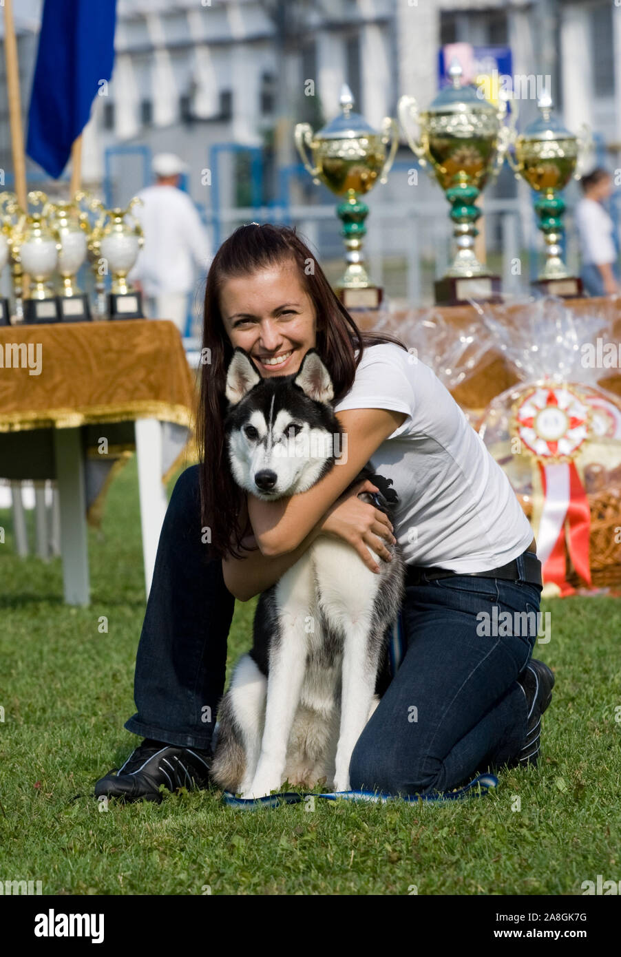 Happy owner with her siberian husky dog Stock Photo - Alamy