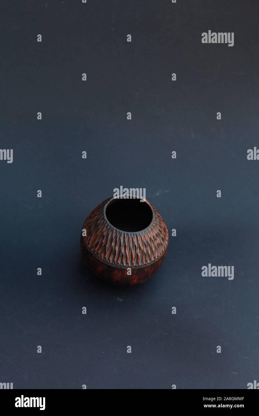 handmade red clay cup for yerba tea on black background, traditional ...