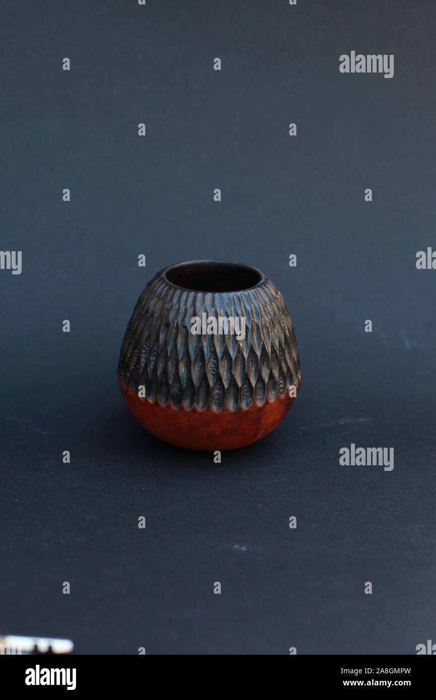 handmade red clay cup for yerba tea on black background, traditional ...