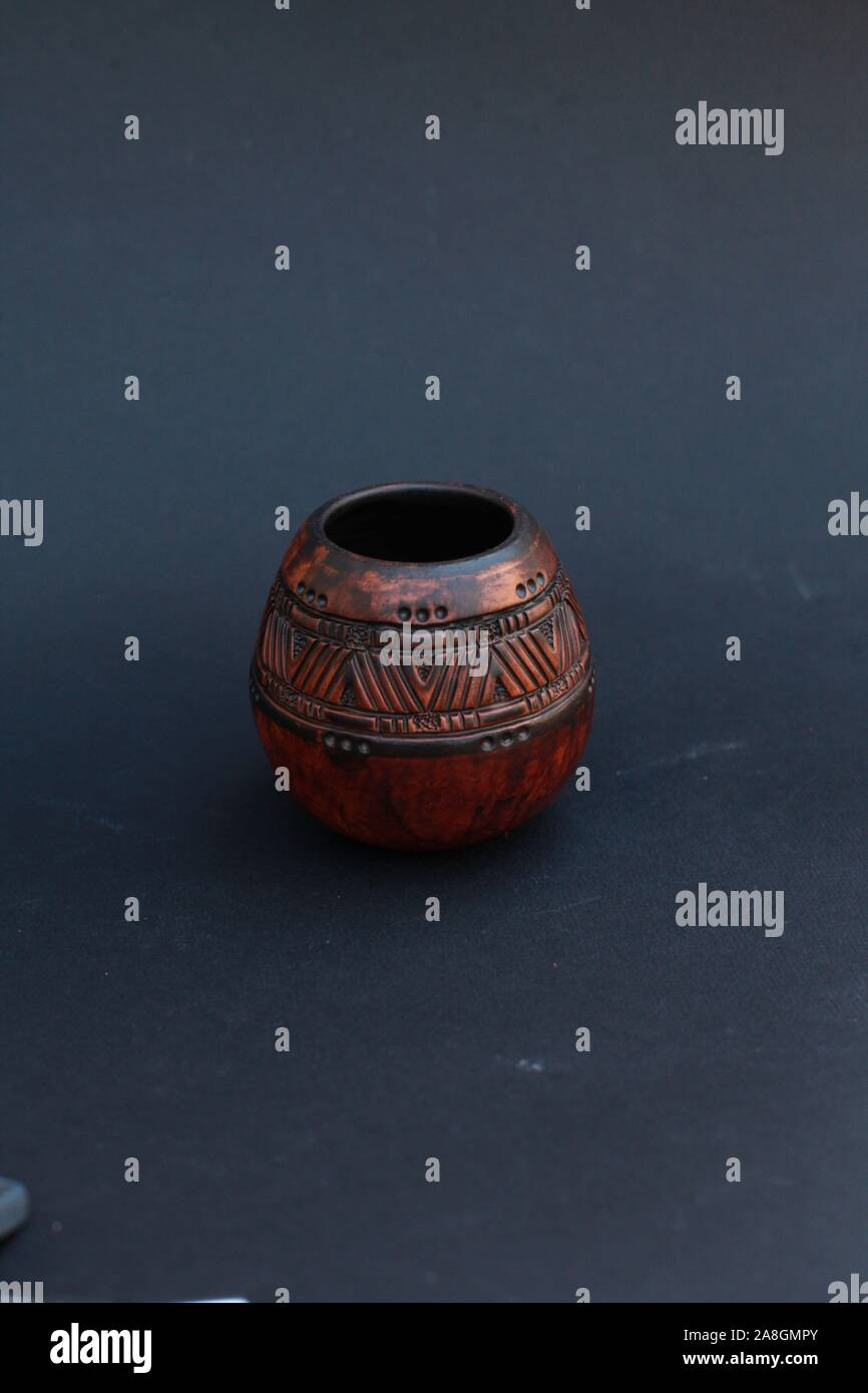 handmade red clay cup for yerba tea on black background, traditional ...