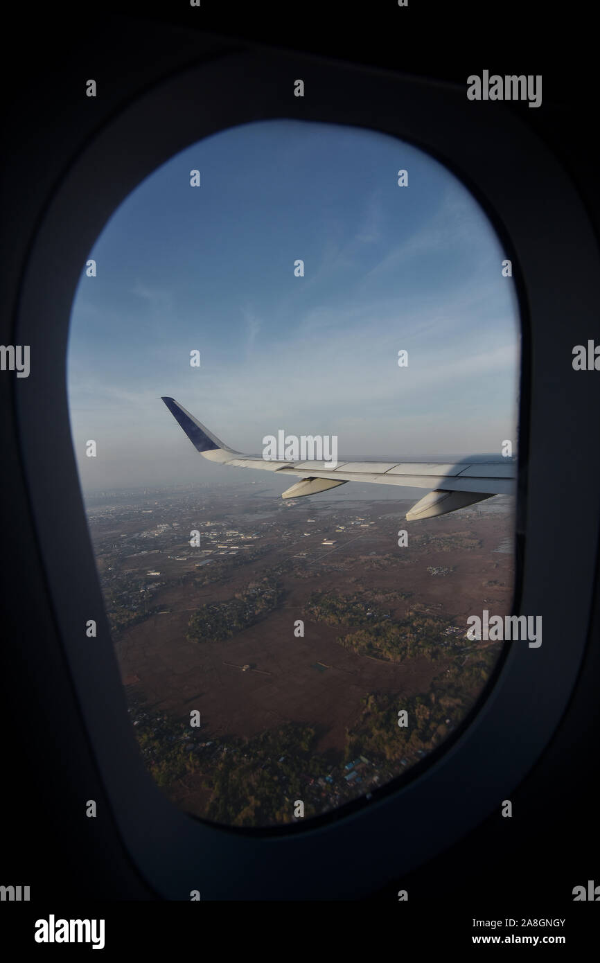 bird view angle, from commercial airplane, windows position near left ...