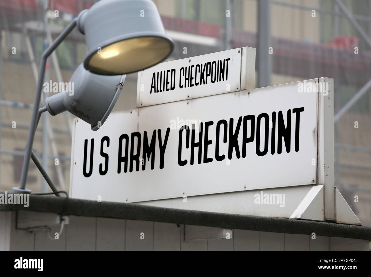historic signpost in the old border point between East Berlin and West ...