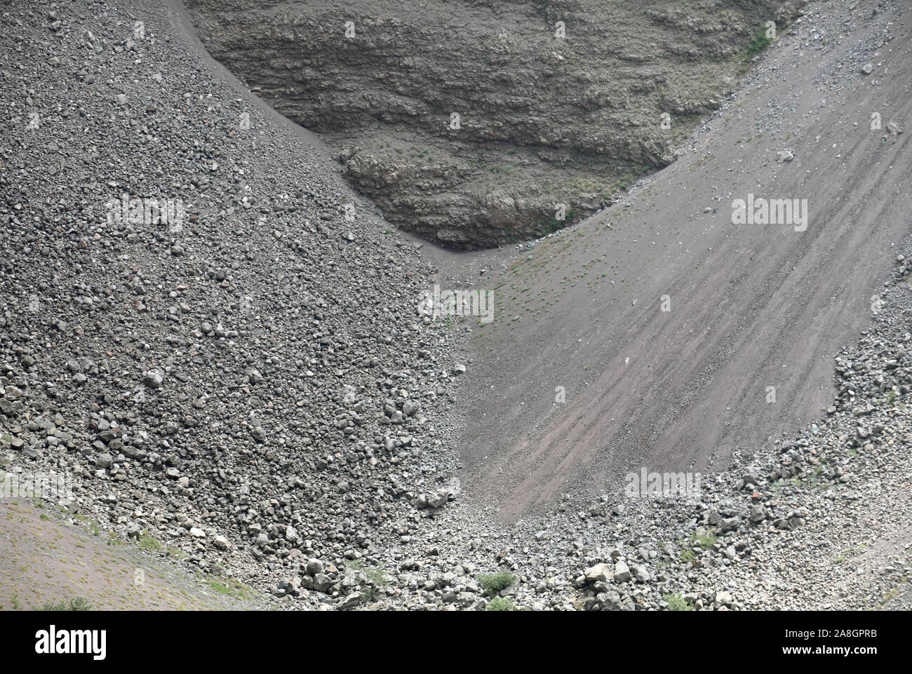 crater of the Vesuvius volcano in Naples covered by rocks and stones ...
