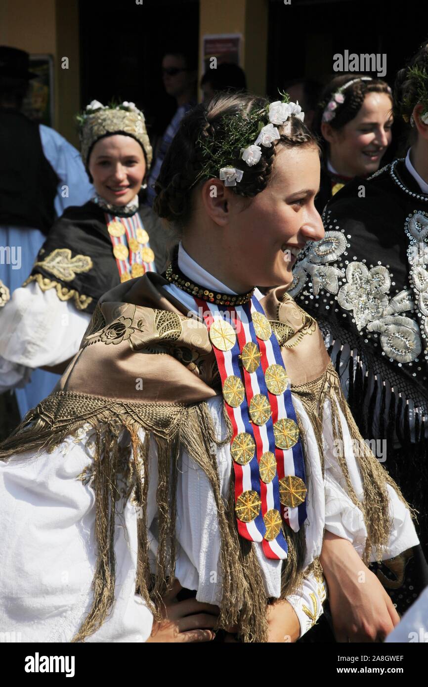Participant in Croatian national costume from the village Siroko Polje ...