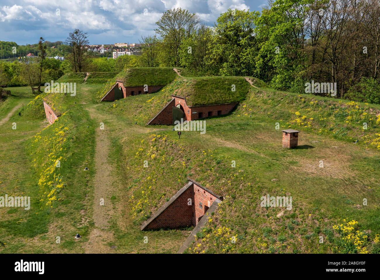 Bunkers covered with ground and grass, dugouts made by bricks and steel ...