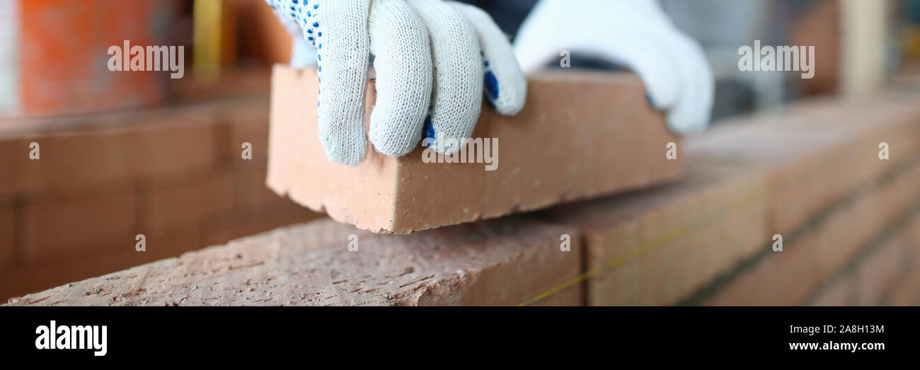 Man laying bricks Stock Photo - Alamy