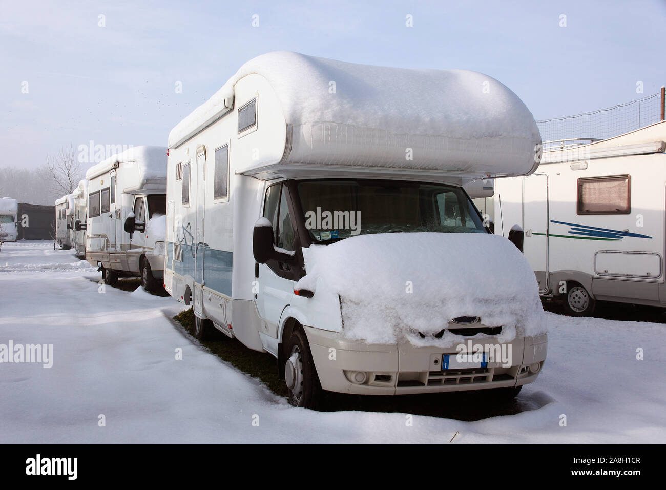 motorhome and caravan at winter with snow Stock Photo - Alamy