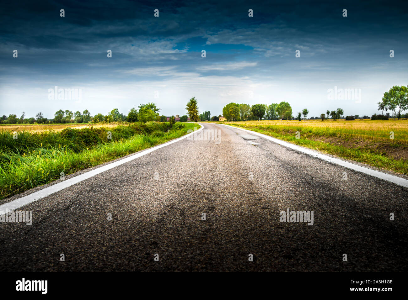 amazing view of a country road Stock Photo - Alamy
