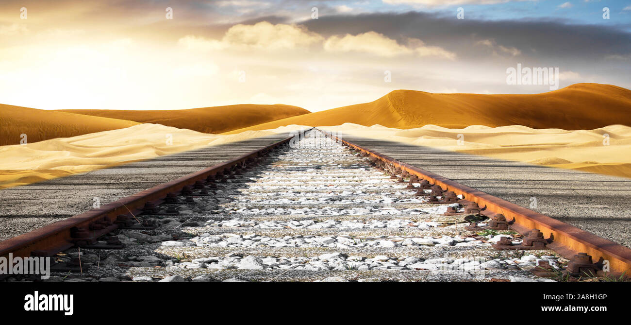 Train rails in desert landscape Stock Photo - Alamy