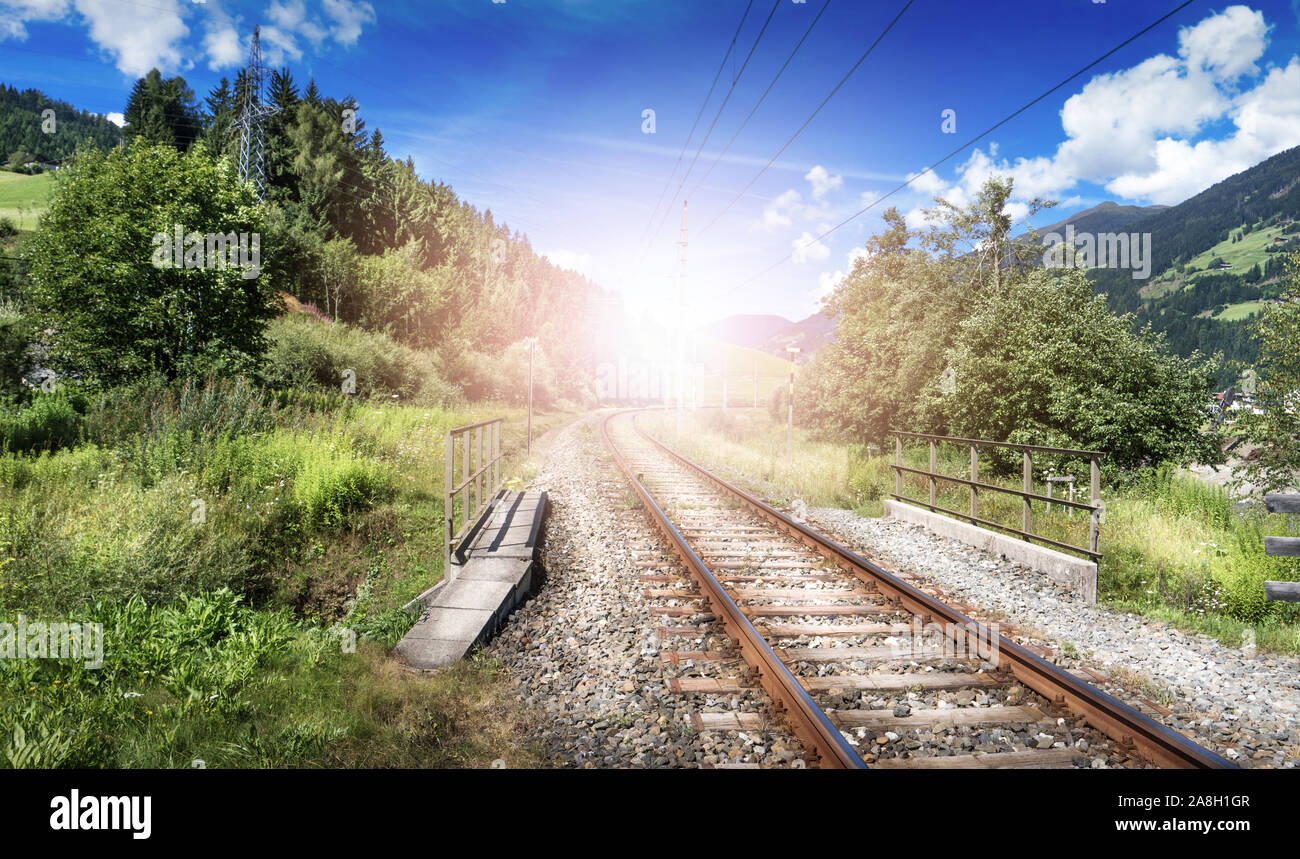 Train rails in Mountain landscape Stock Photo - Alamy