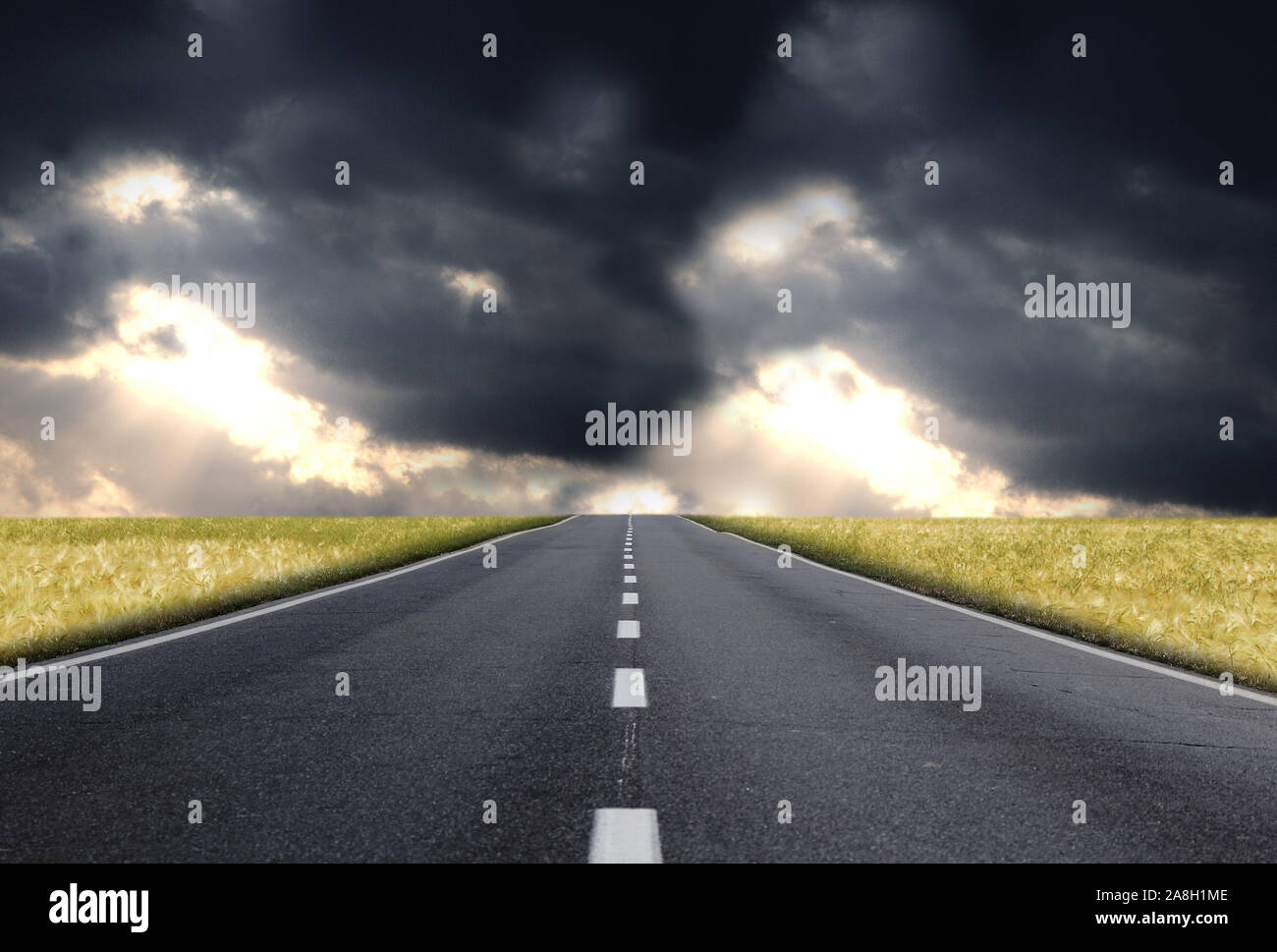 a fantastic desert road with clouds Stock Photo - Alamy