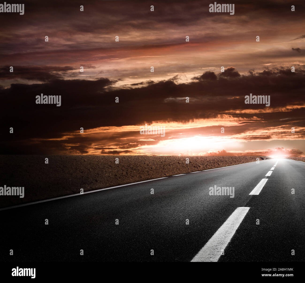 a fantastic desert road with clouds Stock Photo - Alamy